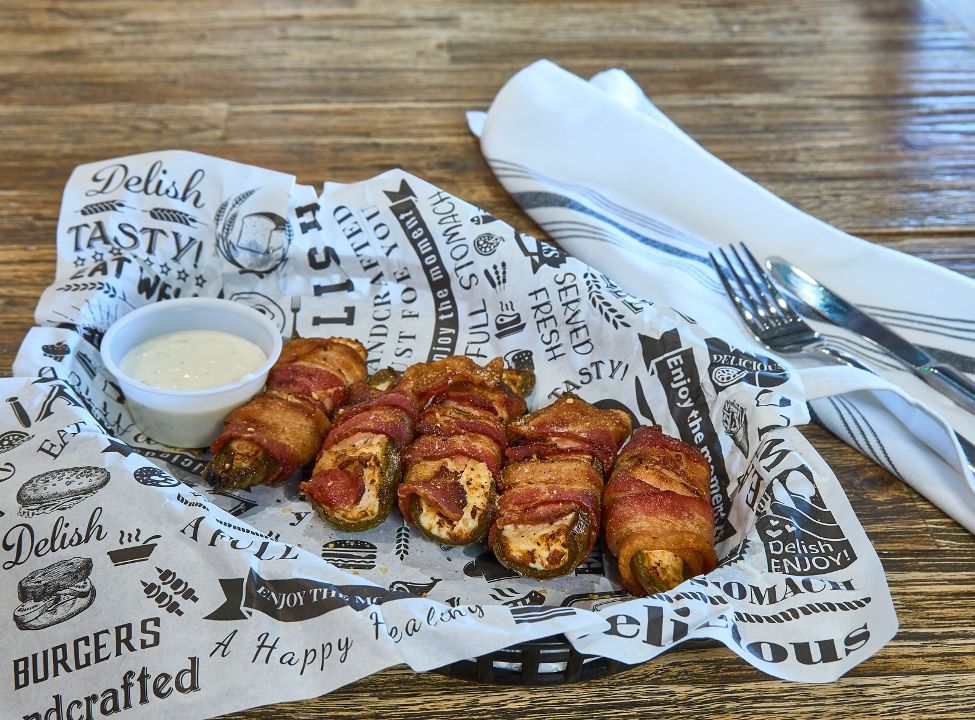 Arc Light Bar and Grill inside the Clarion 441 Rio Concho Drive | Toast