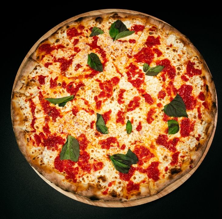 Cassie's Restaurant & Coal Burning Brick Oven Pizza - 1/2 Tray Caesar Salad