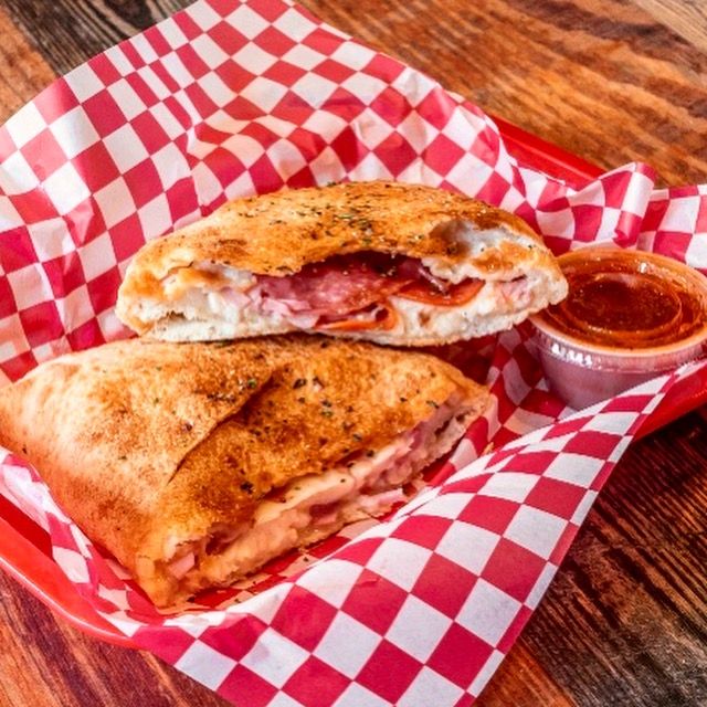 Eddies Calzones Auburn 130 N. College St | Toast