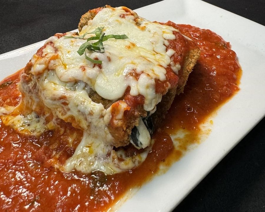 Andrew's Bistro - Italian Creme Cake with coconut & Chocolate chips