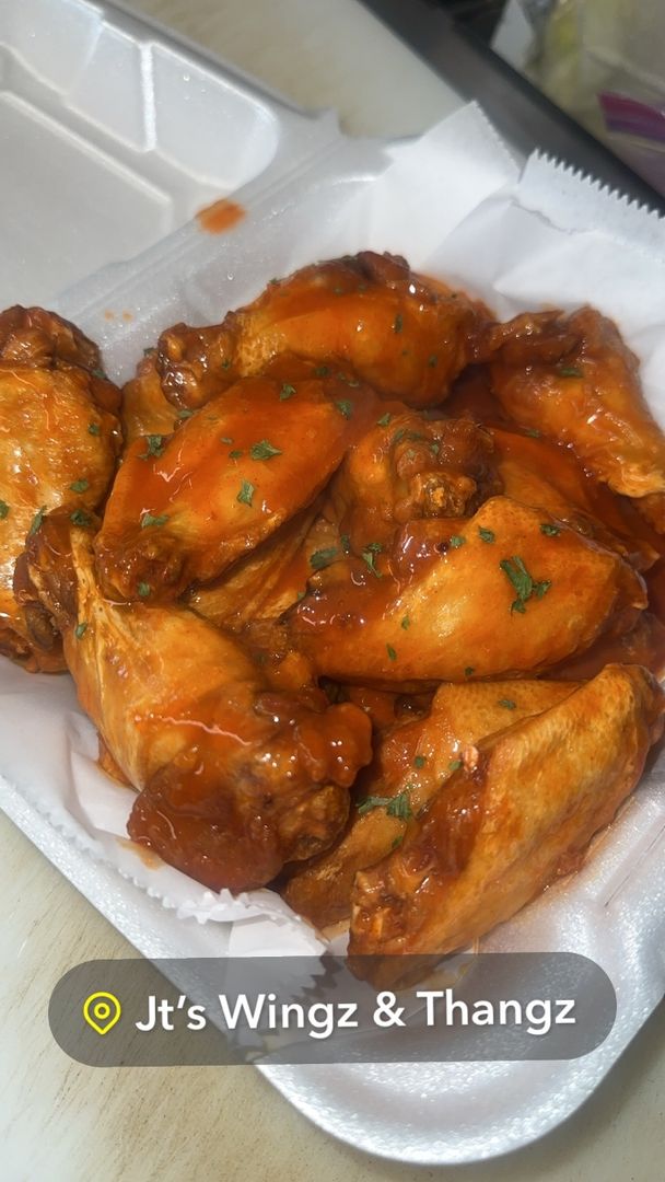 JT’s Wingz & Thangz - Buffalo chicken sandwich and loaded fries