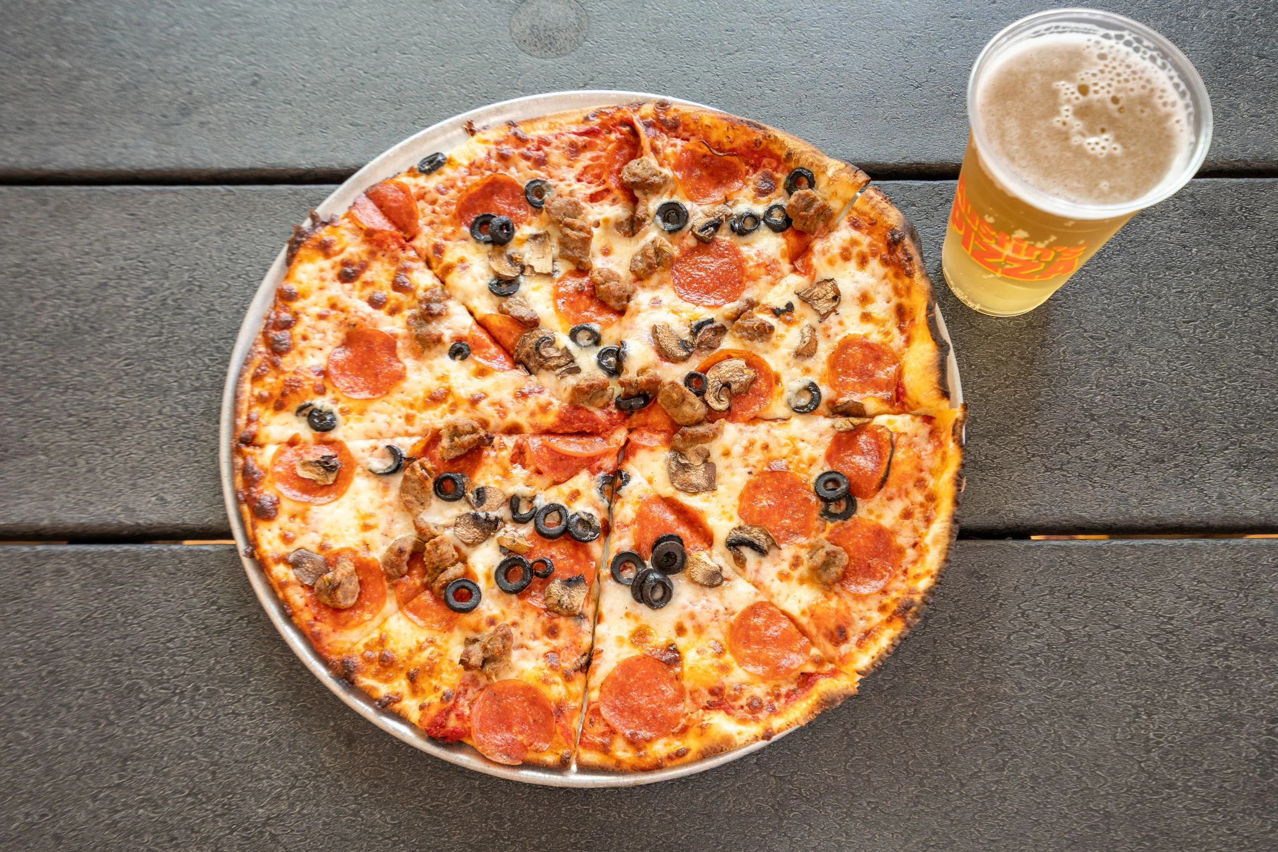 Austin's Pizza - Our Story | Serving Austin TX Pizza Since 1999