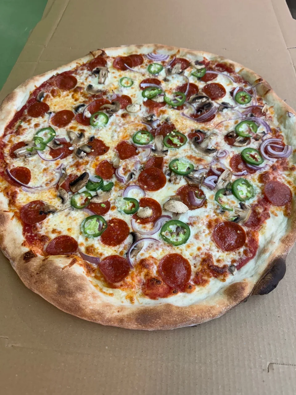 Cowabunga! Pizza Pies | Fresh Hand-tossed N.Y. Pizza in Chicago