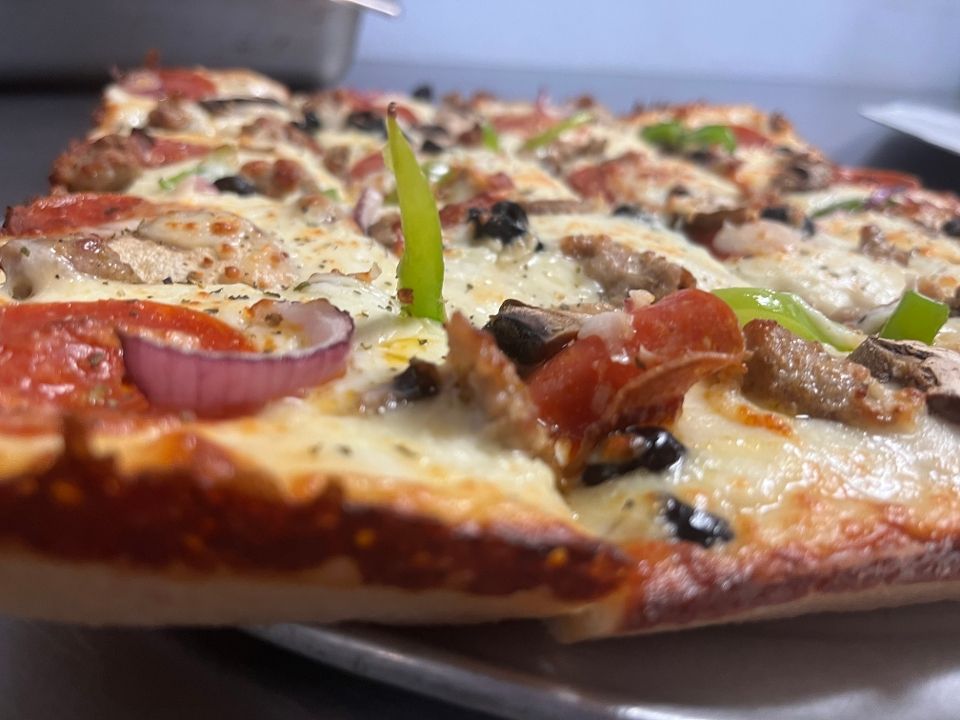 Bucky’s Pizza - NASHVILLE HOT HONEY LOADED FRIES