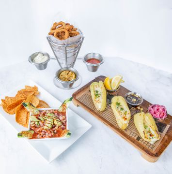 CRUDA Mariscos & Oyster Bar - VOSS