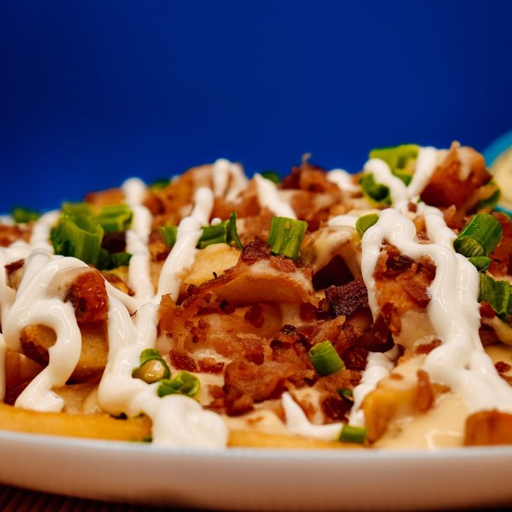 Camp Margaritaville Auburndale - Sausage and Mushroom Pizza