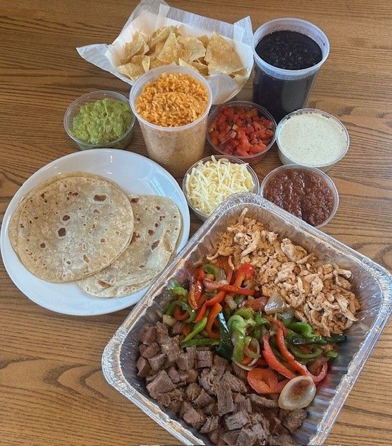 Mojo's Tacos - The Factory at Franklin - Mojo's Cheesy Chicken & Rice Bowl